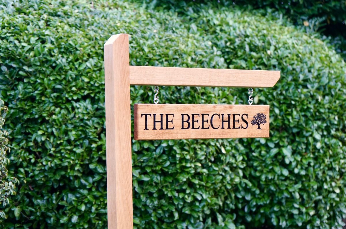 Engraved Oak Hanging Sign on Post | MakeMeSomethingSpecial.com